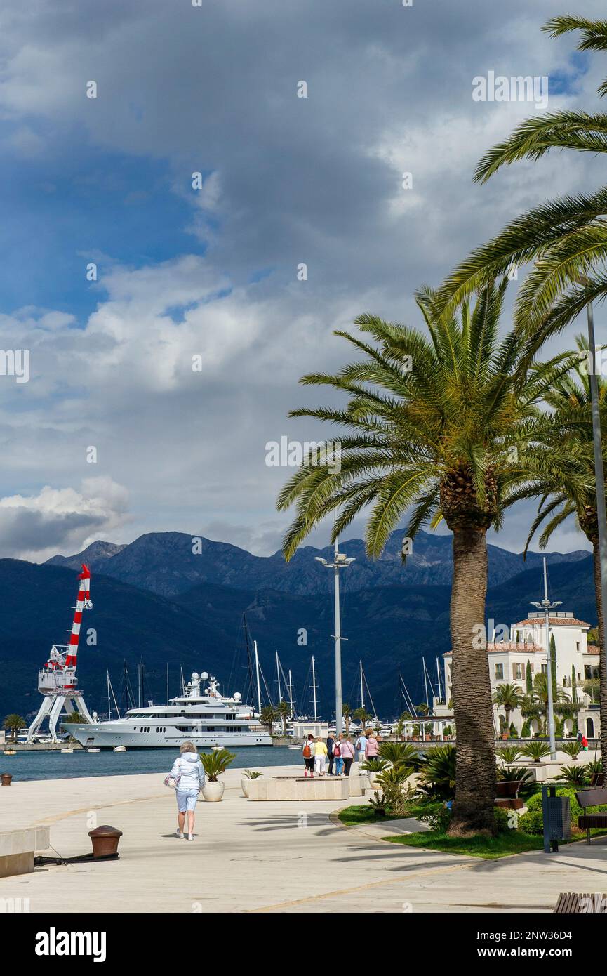 People strolling along the seafront in Porto Montenegro, a full-service ...