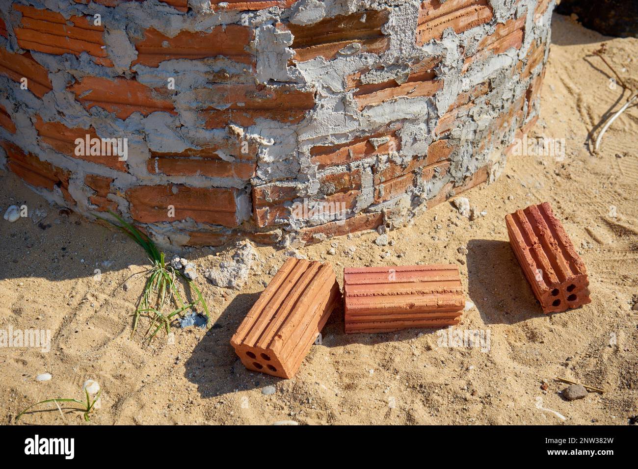 Bricks with brick wall building Stock Photo - Alamy