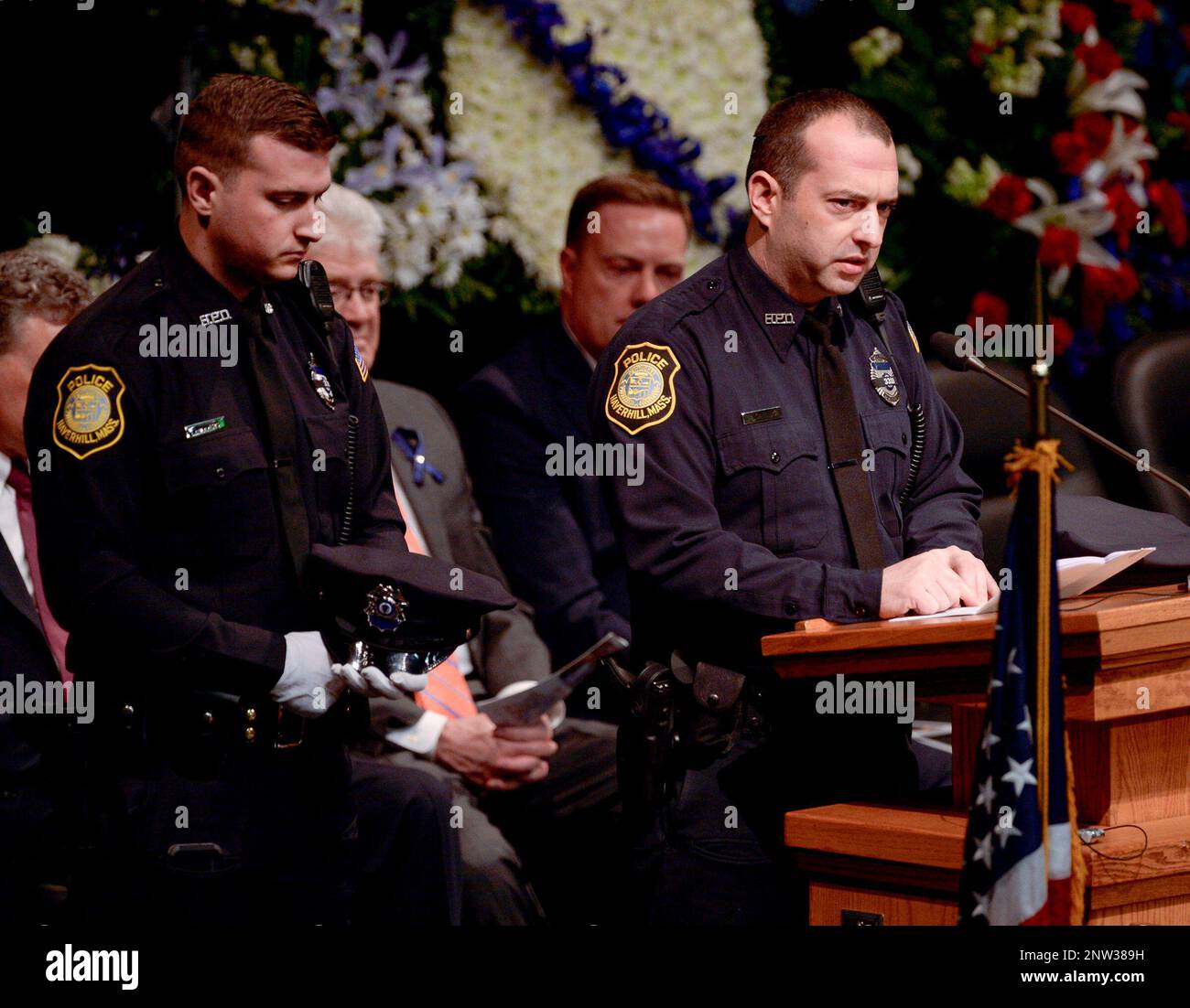 From left, Haverhill, Mass. Police Department officer Thomas Shinners ...