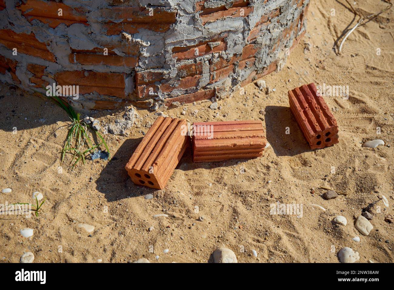Bricks with brick wall building Stock Photo - Alamy