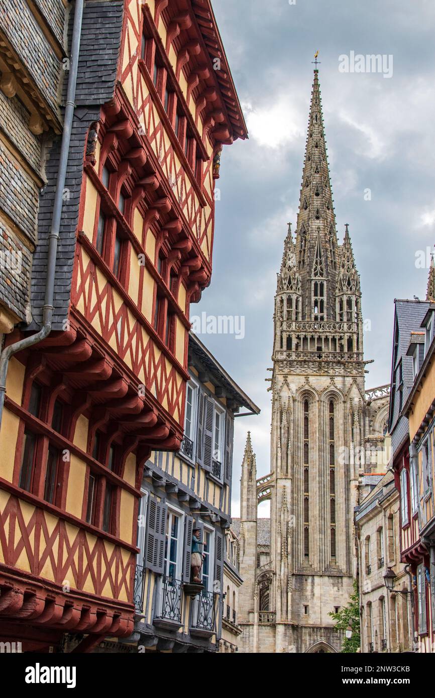 Quimper. View of the Saint-Corentin cathedral from a street in the old ...