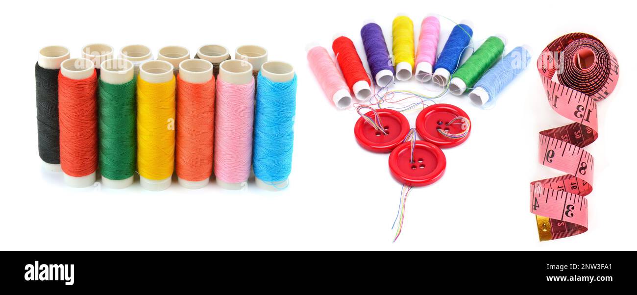 Set of spools of thread, buttons and measuring tape isolated on white ...