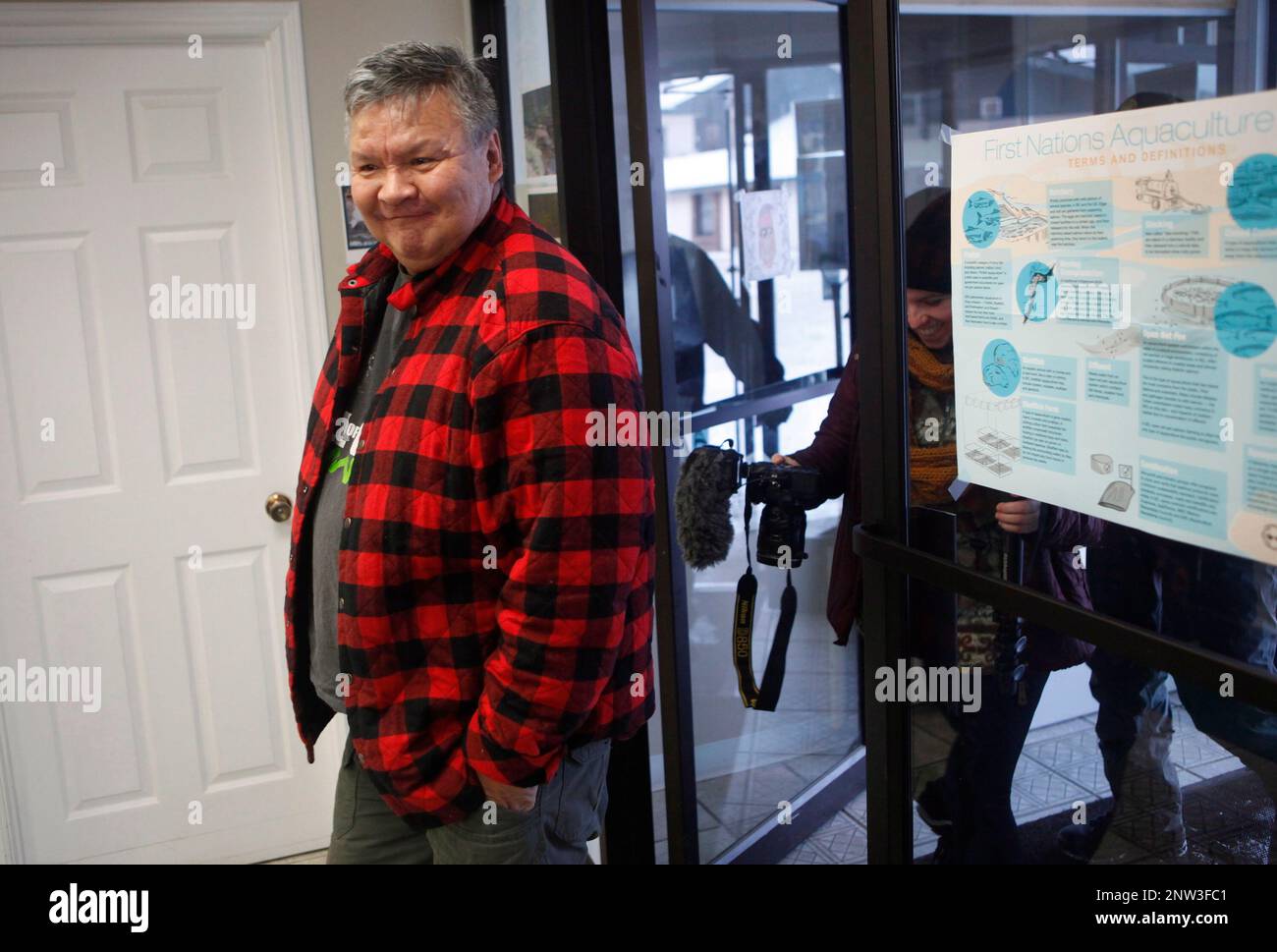 Fisheries and Wildlife Department technician Brian Michell arrives at ...