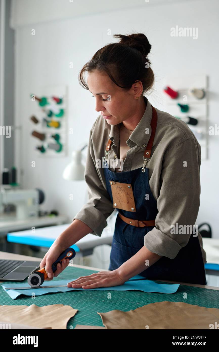 Woman bending over table hi-res stock photography and images - Alamy