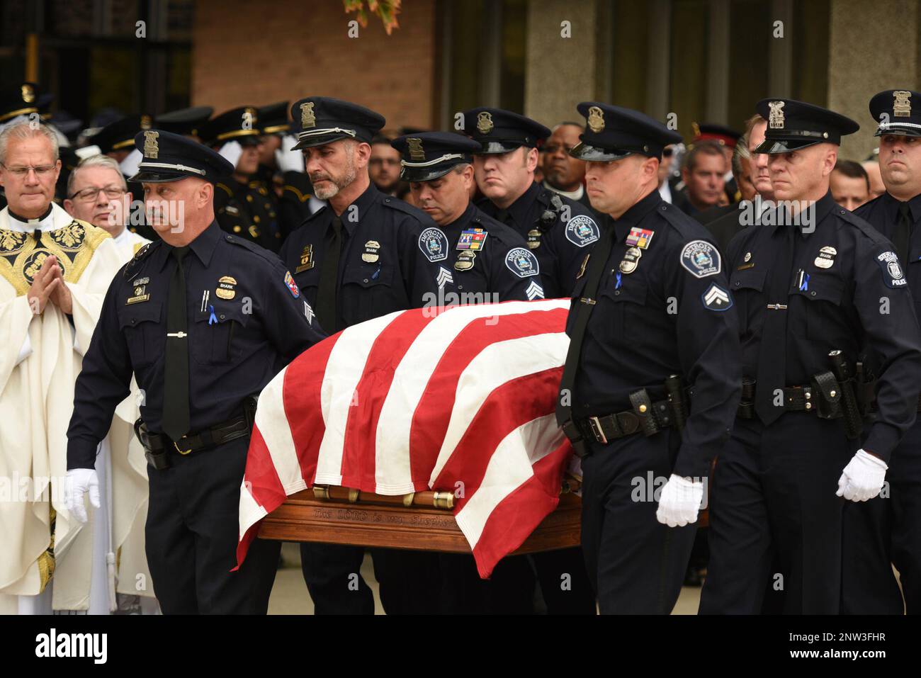 Detroit Police Sgt. Kenneth Steils casket is carried to the hearse ...