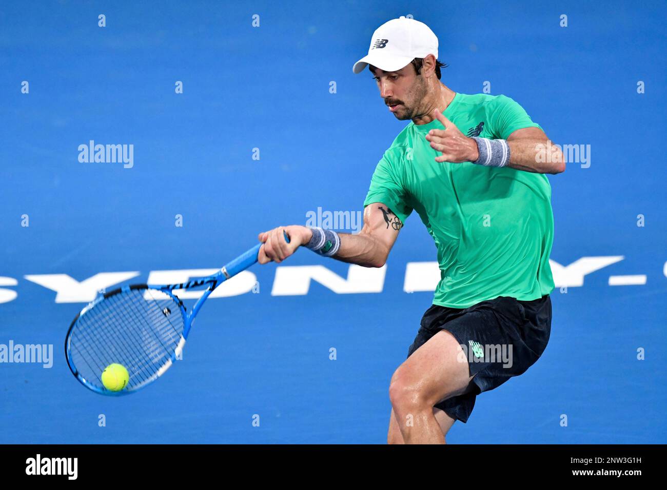 SYDNEY, AUSTRALIA - JANUARY 10: Jordan Thompson (AUS) hits a forehand ...