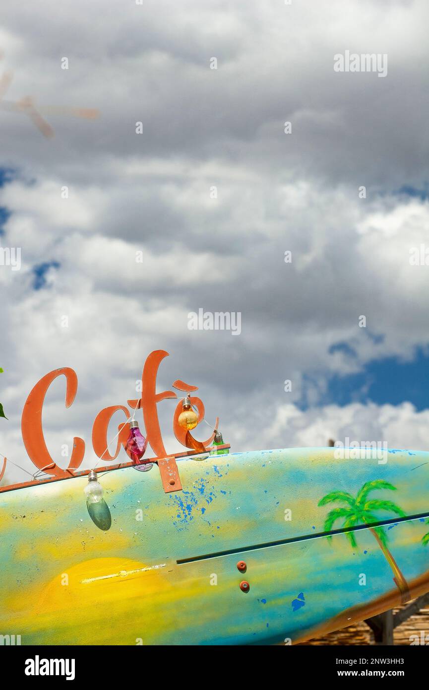 The colourful sign of a beach cafe by the Dune di Torre Colimena beach ...