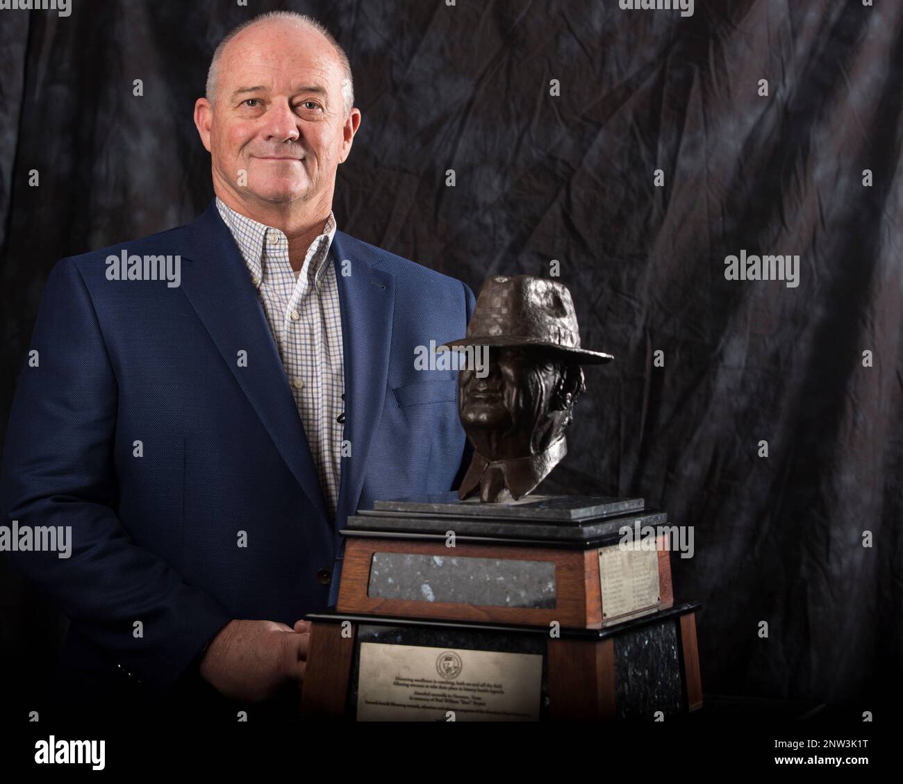 Fresno State coach Jeff Tedford poses for a photograph with the Paul ...