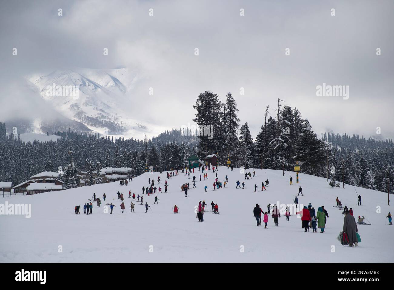 People ski on a slop in Gulmarg, 55 kilometers (34 miles) north of ...