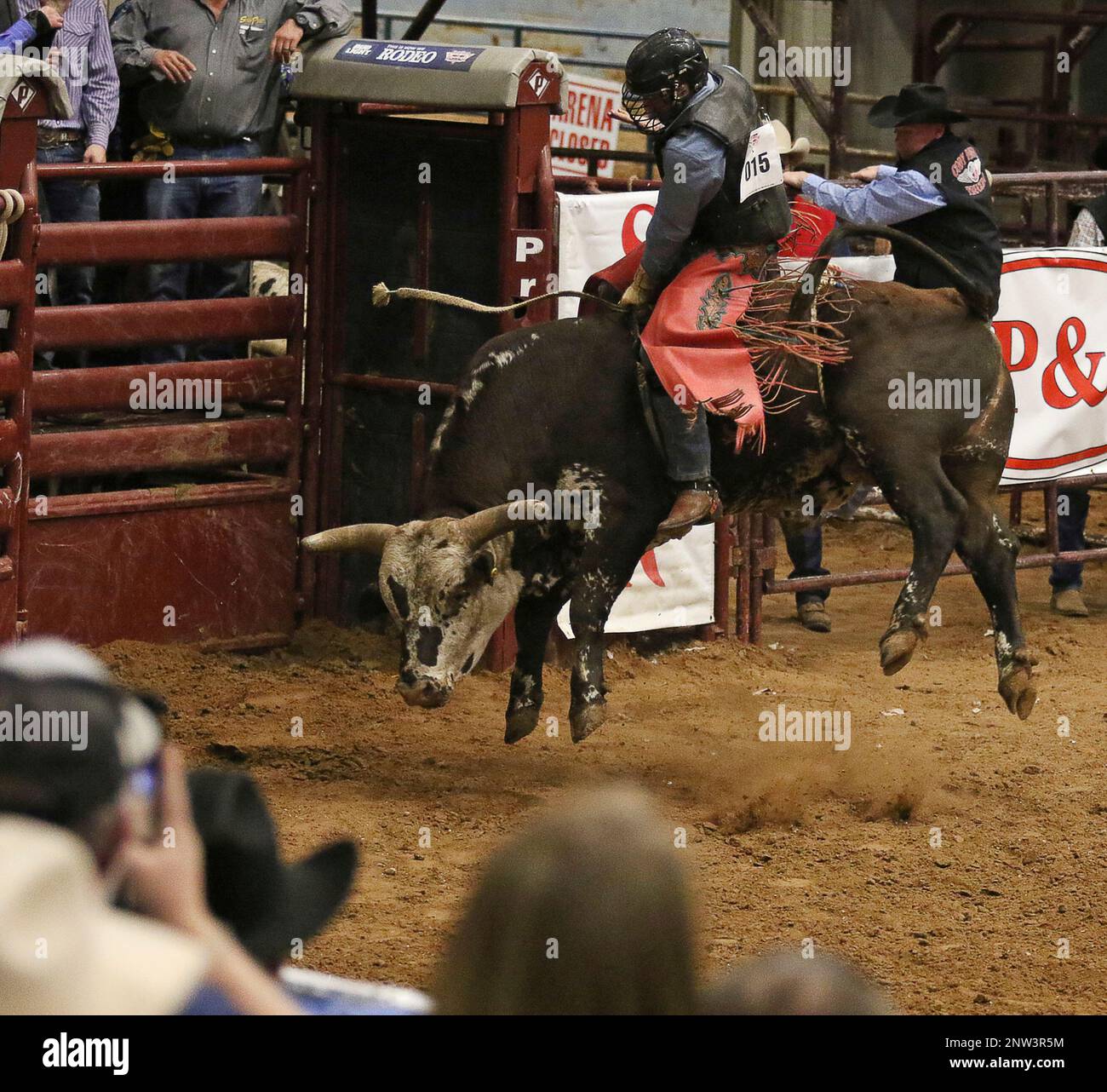 Clayton Appelhans of Colby, KS., competes in bull riding during the ...