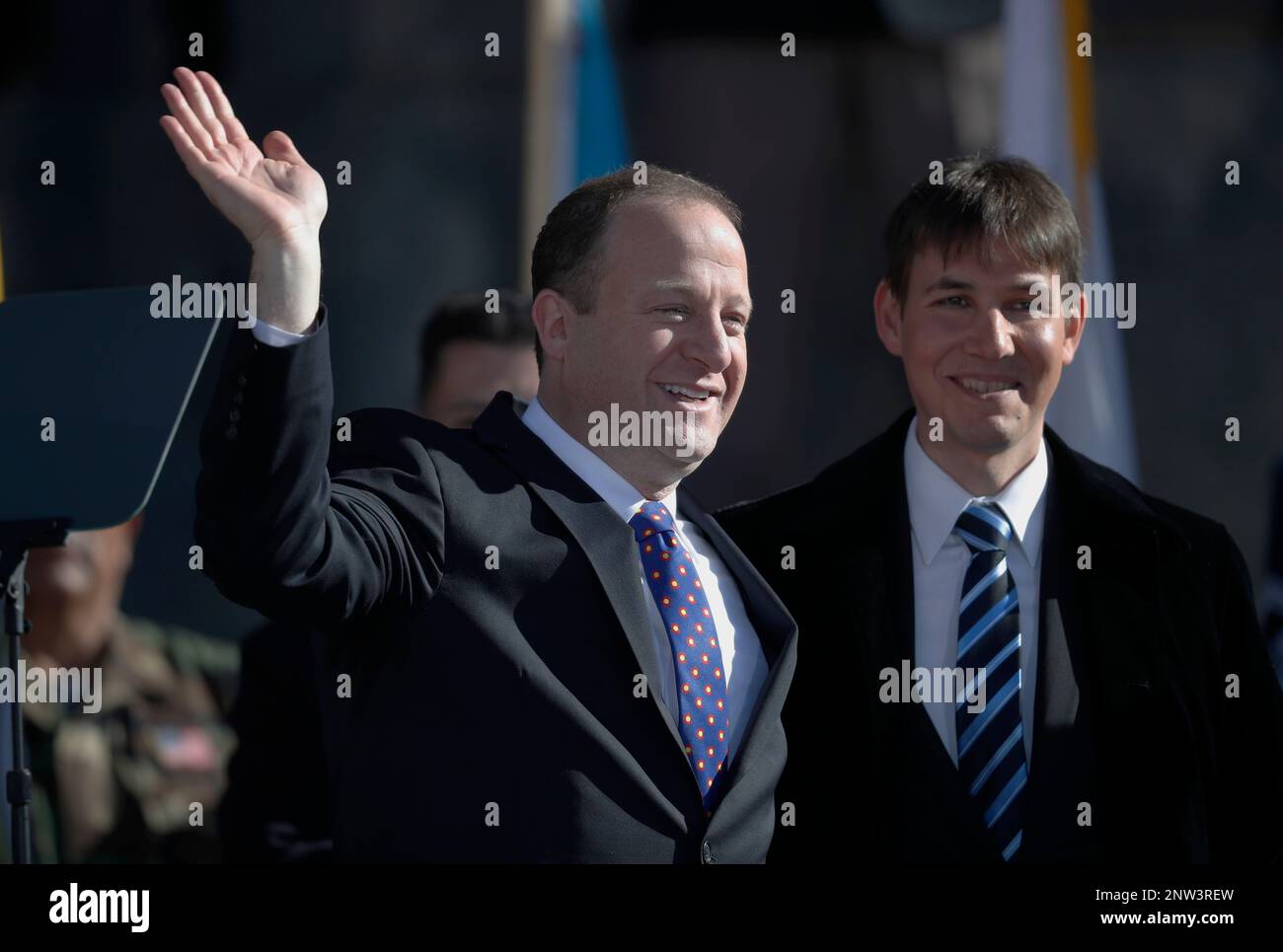 Colorado Gov. Jared Polis, left, joins his partner, Marlon Reis, in ...