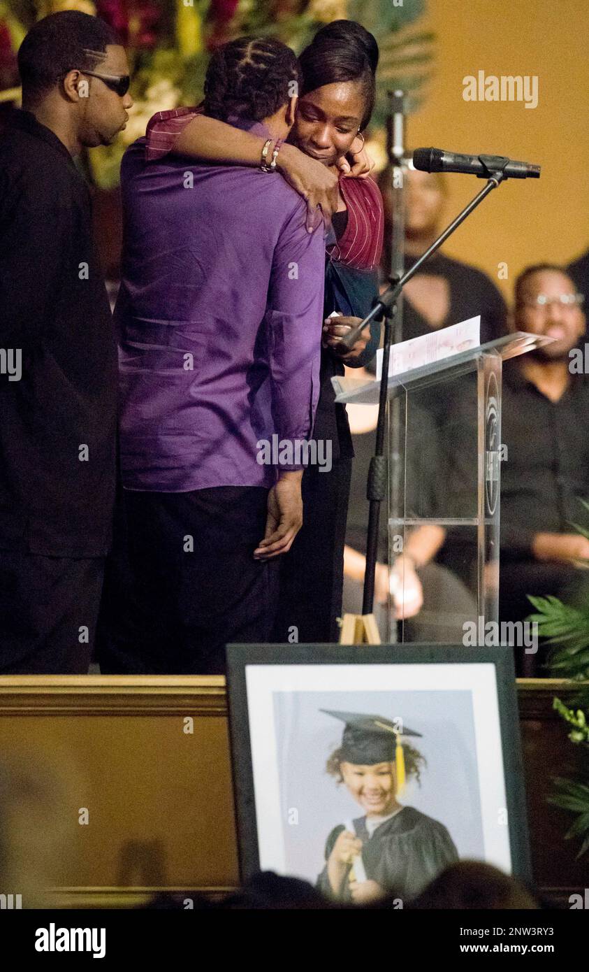 LaPorsha Washington and James Barnes embrace after speaking about their ...