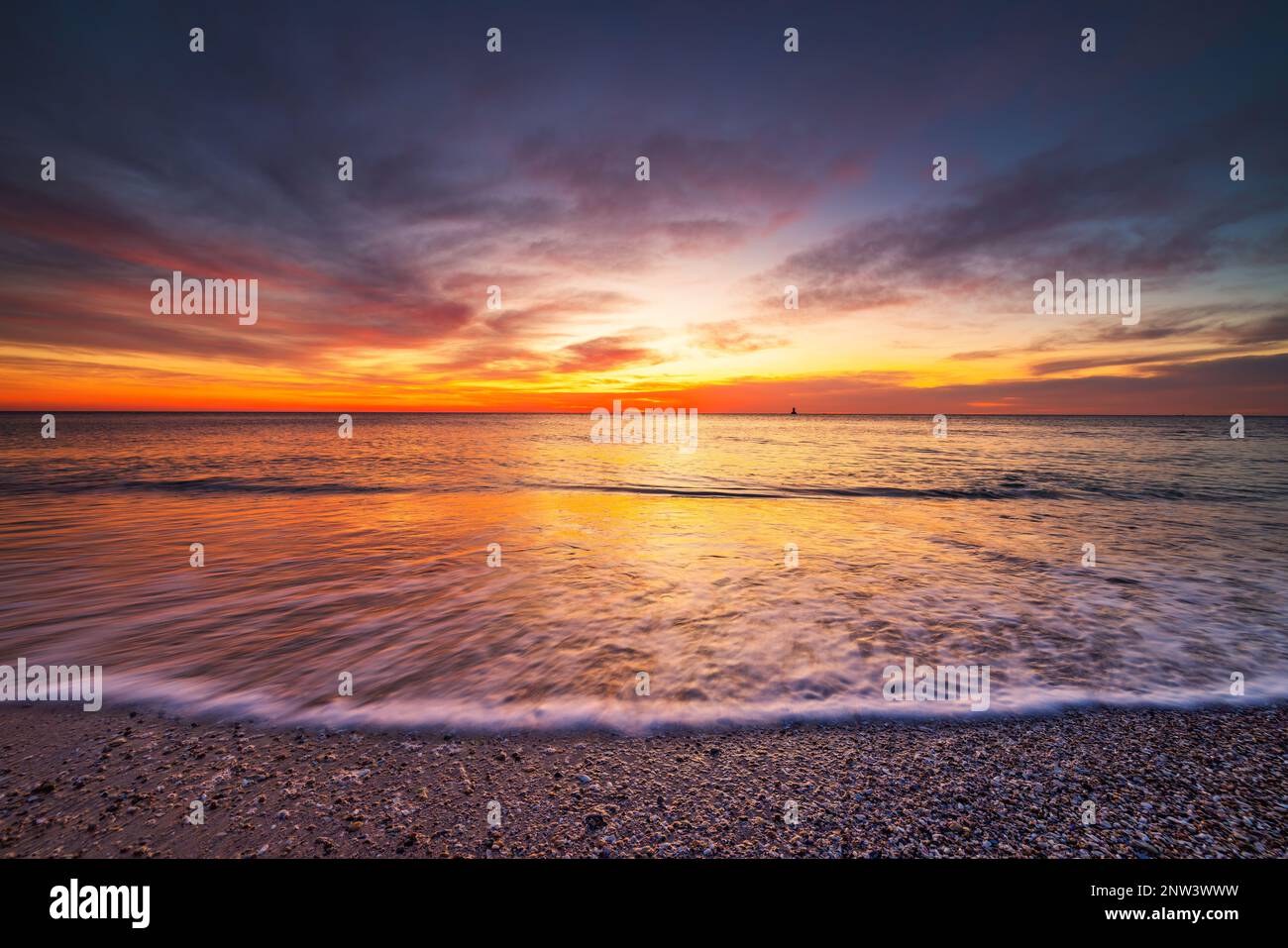 Beautiful cloudscape over the sea shore, scenic ocean beach sunrise ...