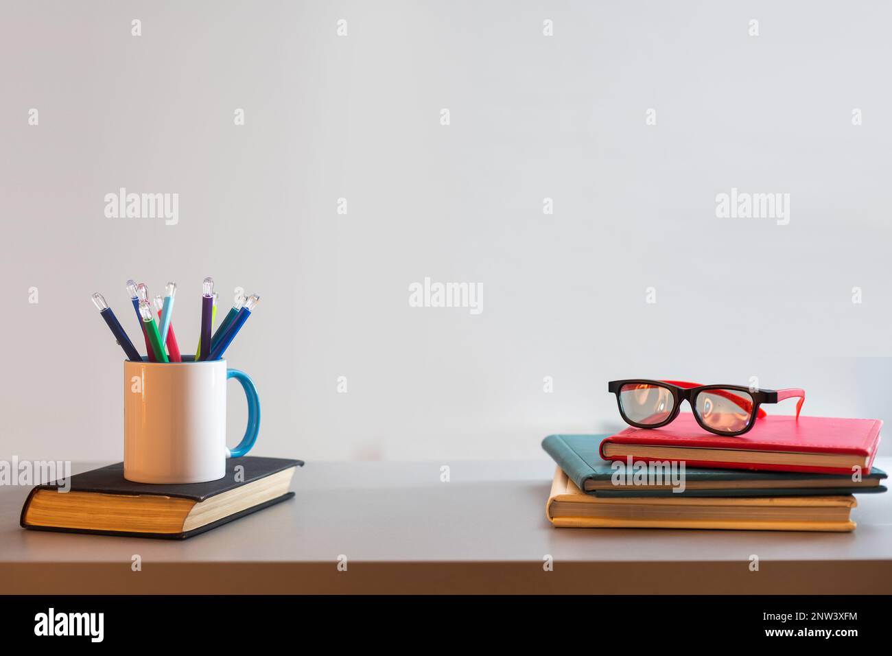 Stack books on table child hi-res stock photography and images - Alamy