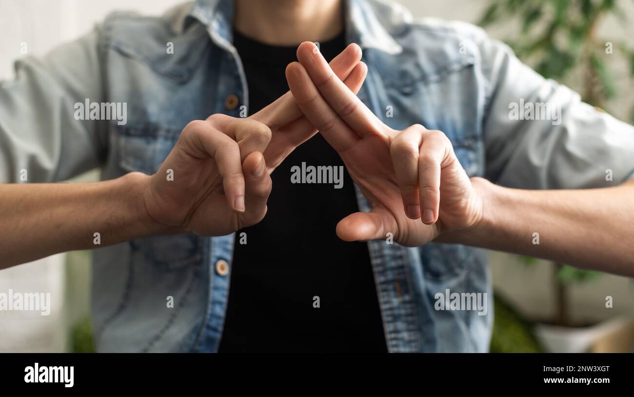 Sign language interpreter man translating a meeting to ASL, American ...