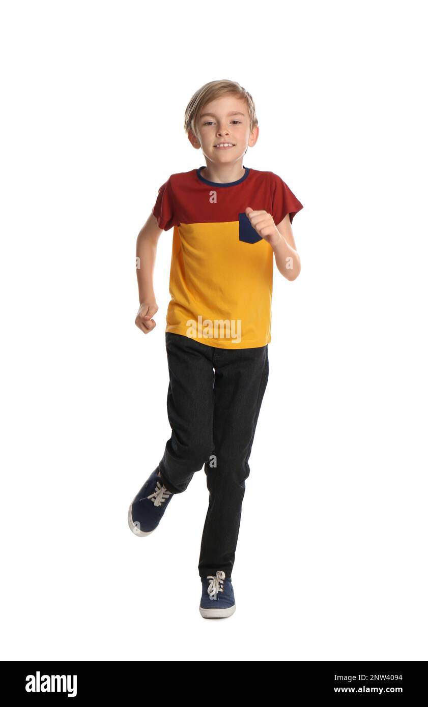 Cute little boy running on white background Stock Photo - Alamy