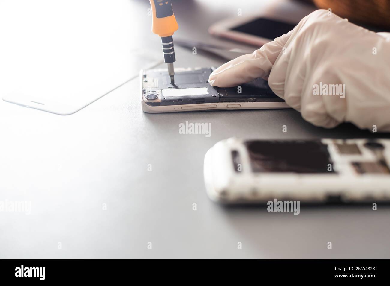 Close-up photos showing process of mobile phone repair Stock Photo - Alamy