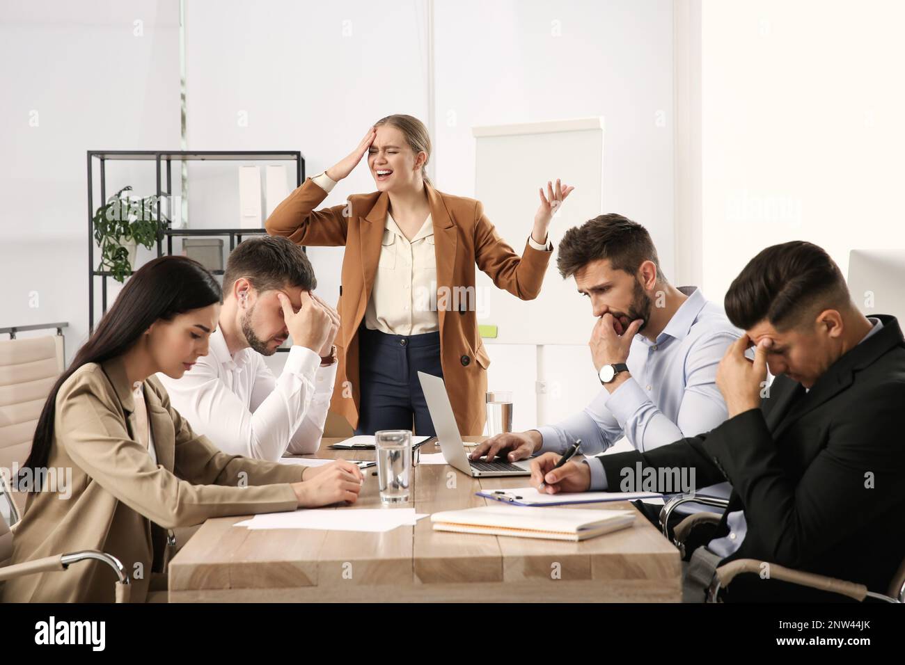 Boss screaming at employees in office. Toxic work environment Stock ...