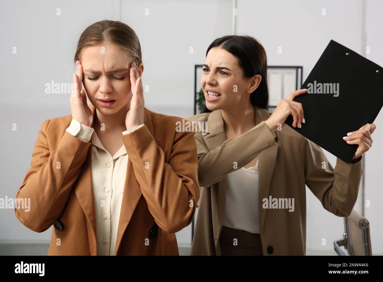 Boss screaming at employee in office. Toxic work environment Stock ...