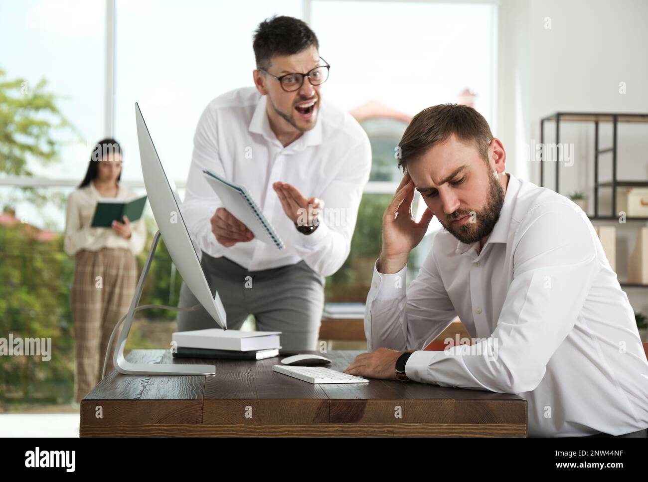 Boss screaming at employee in office. Toxic work environment Stock ...