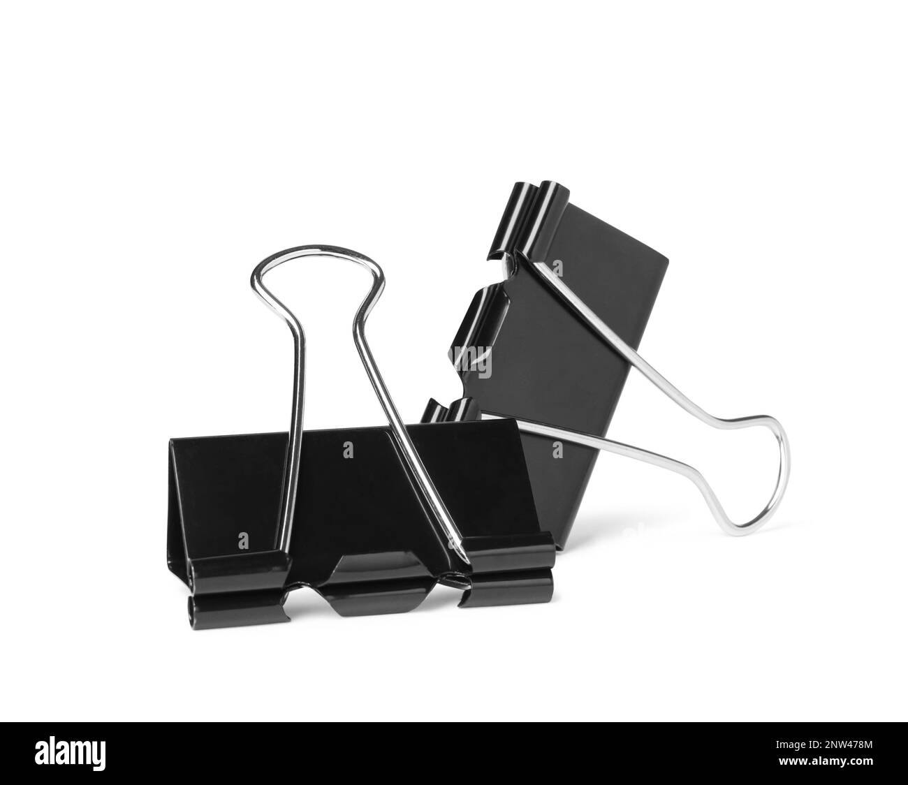 Black binder clips on white background. Stationery Stock Photo - Alamy