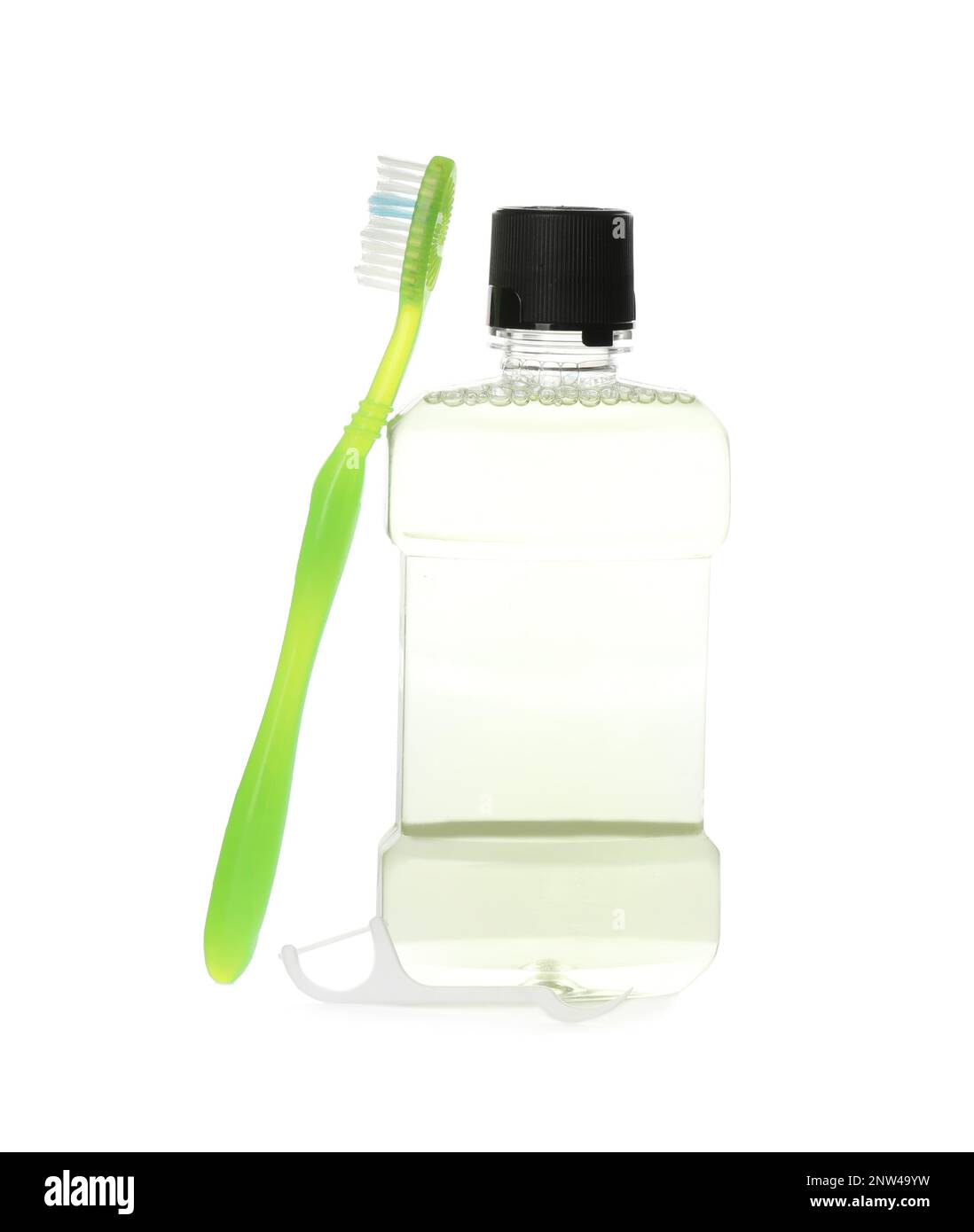 Bottle with mouthwash and toothbrush on white background Stock Photo ...