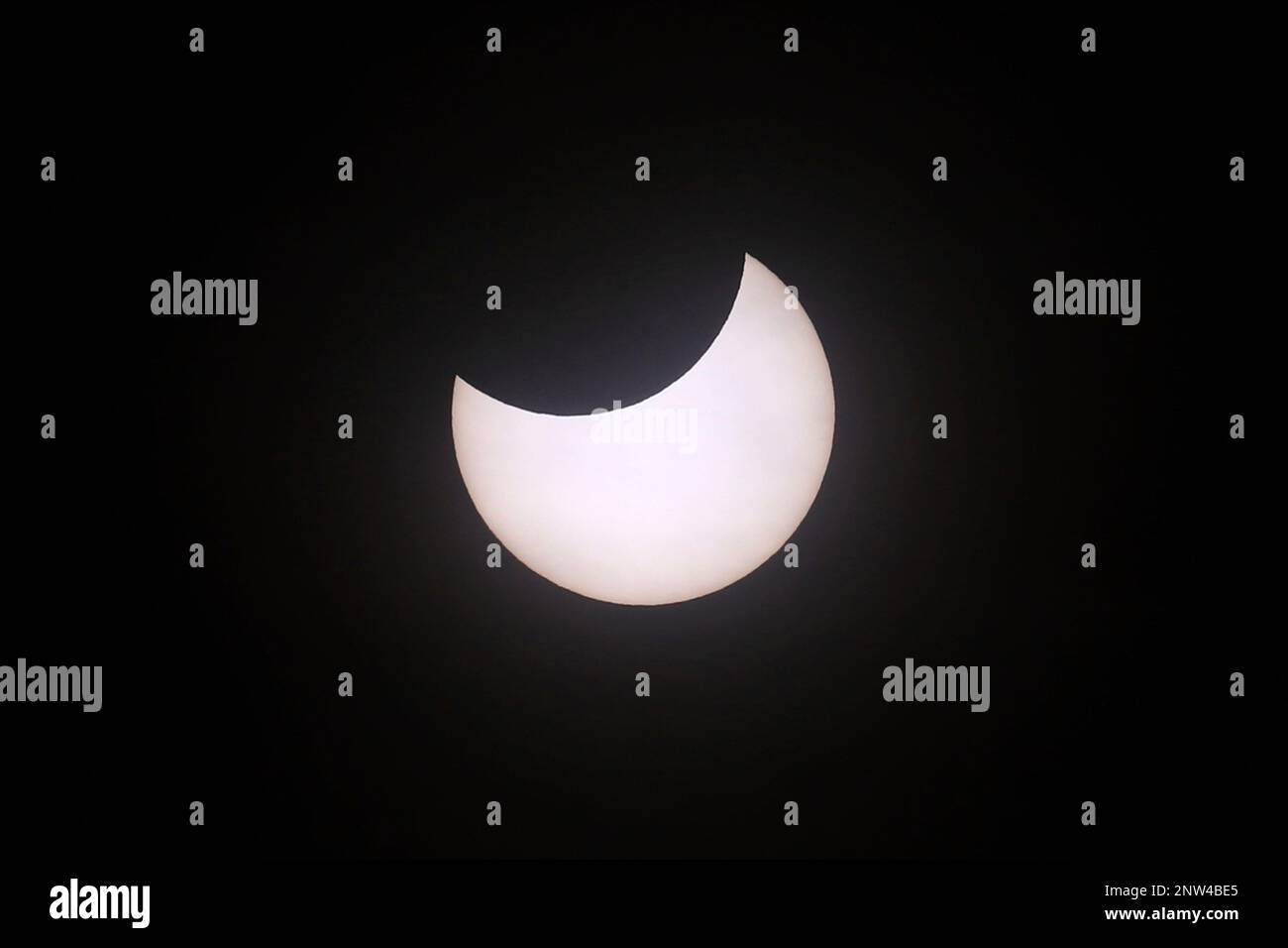 A photo shows a partial solar eclipse observed in Sendai, Miyagi ...