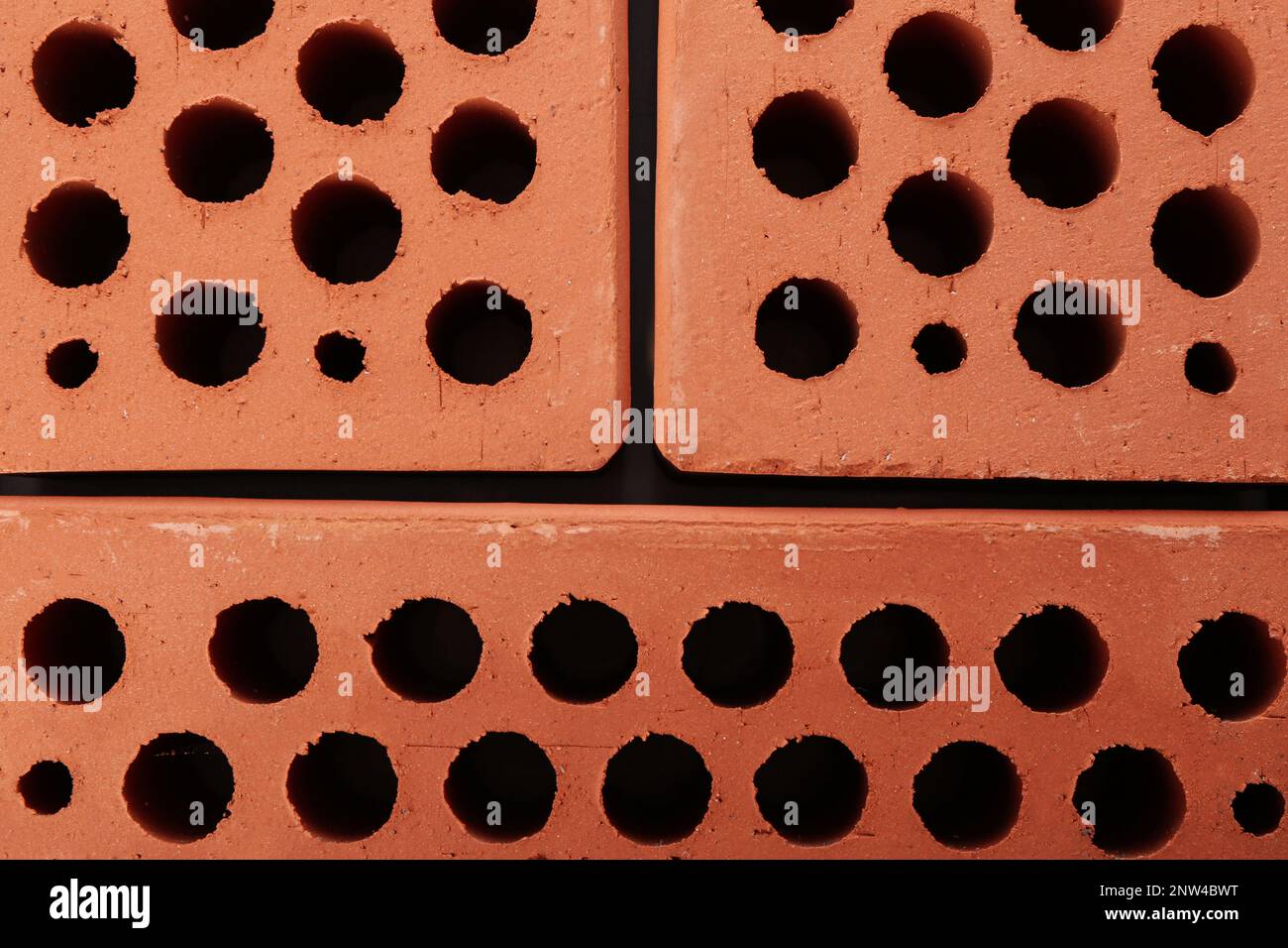Red bricks wall as background. Building material Stock Photo - Alamy