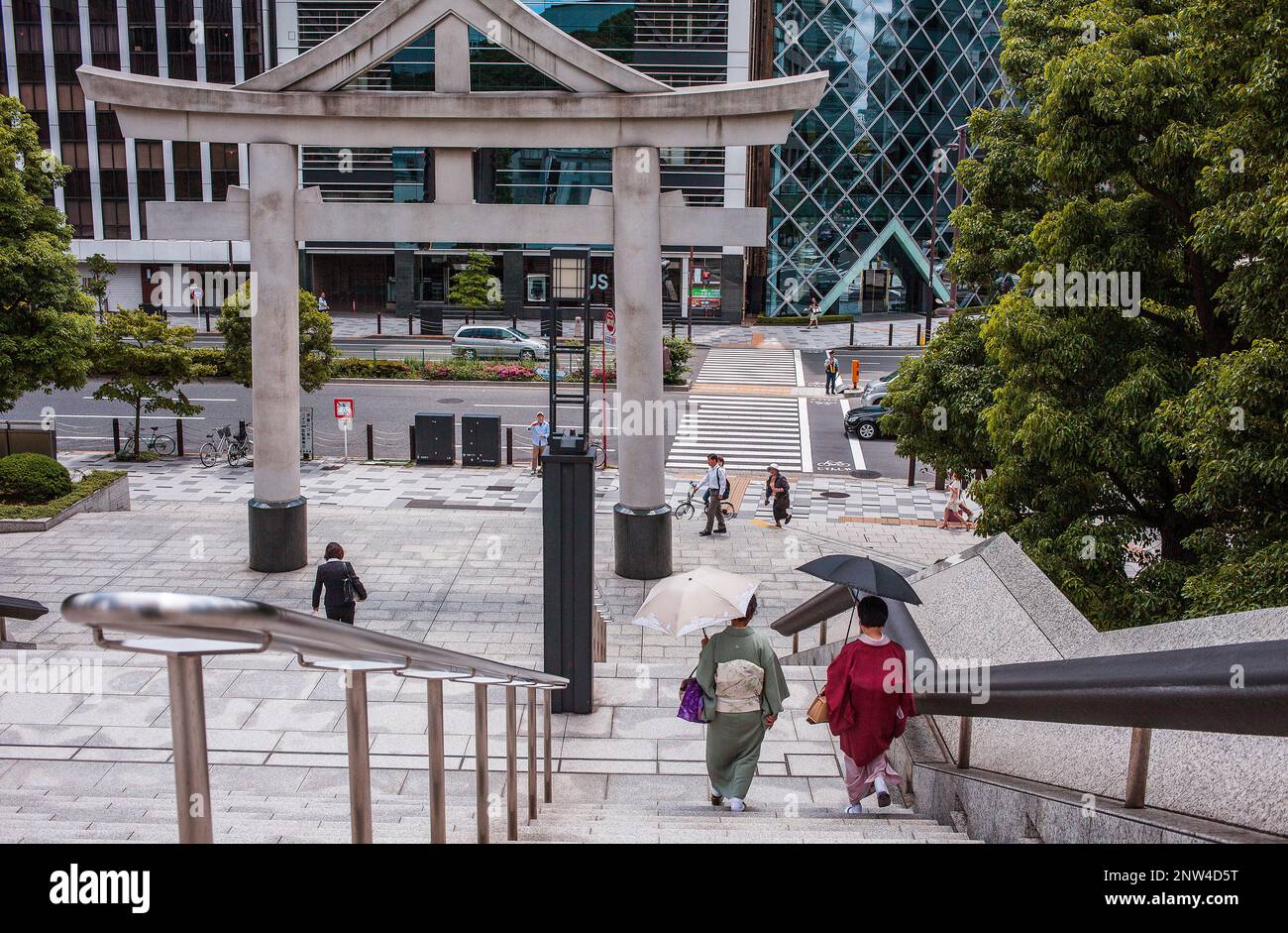 Women at main entrance of HieJinja shrine, Nagata-cho.Tokyo city, Japan ...