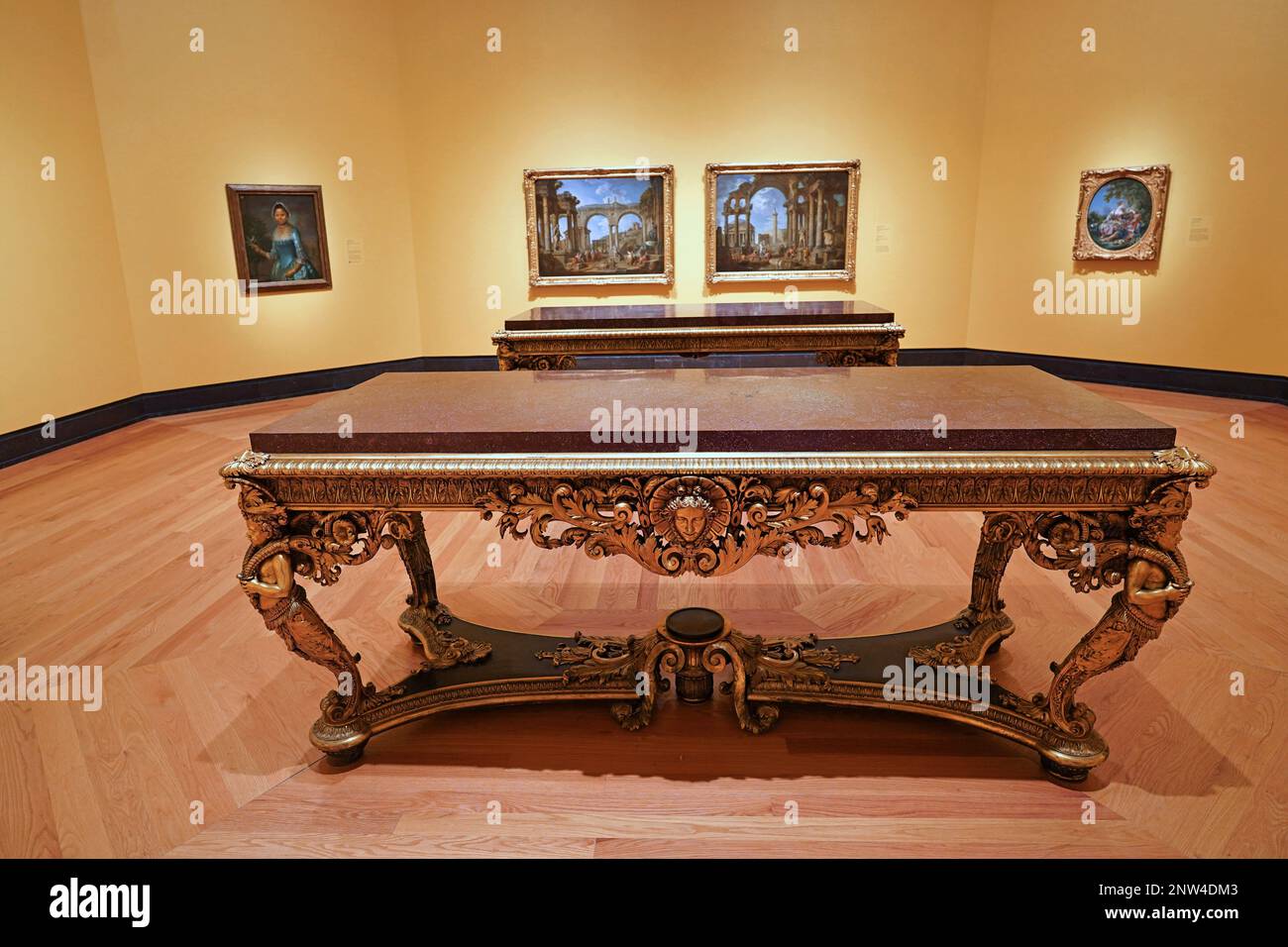 Room with ornate bronze and marble baroque style tables at the Art ...