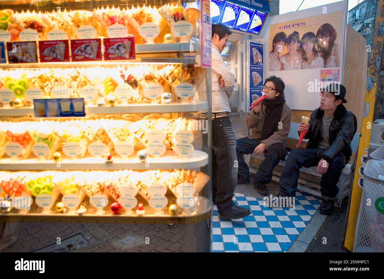 Harajuku. Takeshita Dori. Crepes stall. Friends eating crepes.Tokyo ...