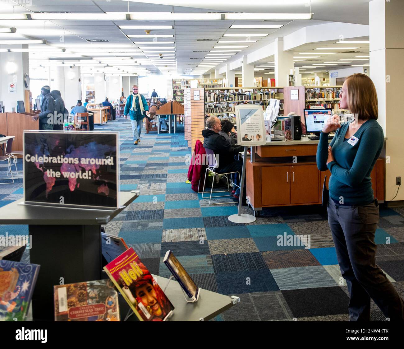 Alicia Kwande looks around the main level of the Penrose Library on ...