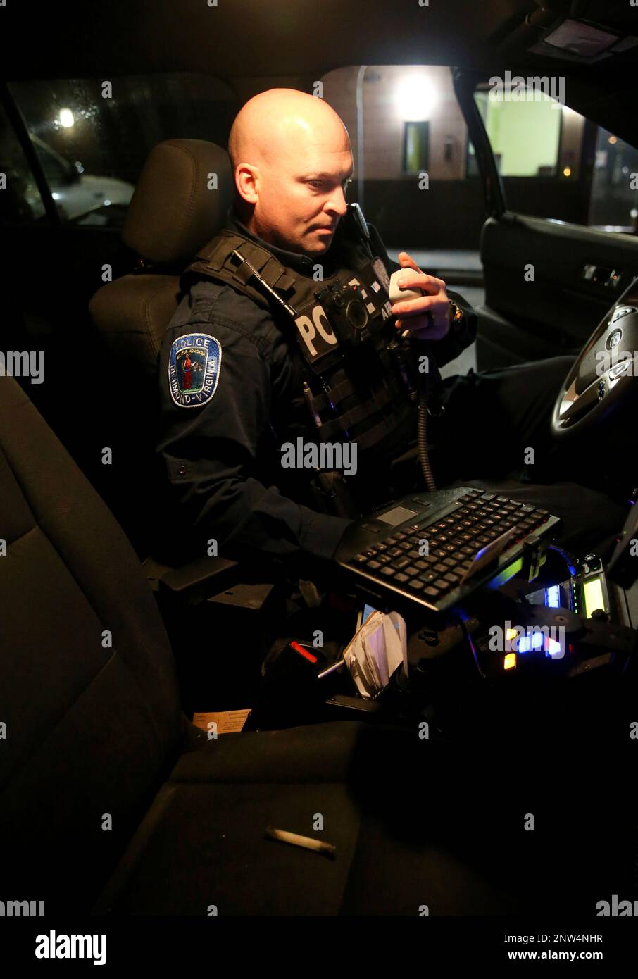Officer Ben Frazer in his patrol car after confiscating a crack pipe ...