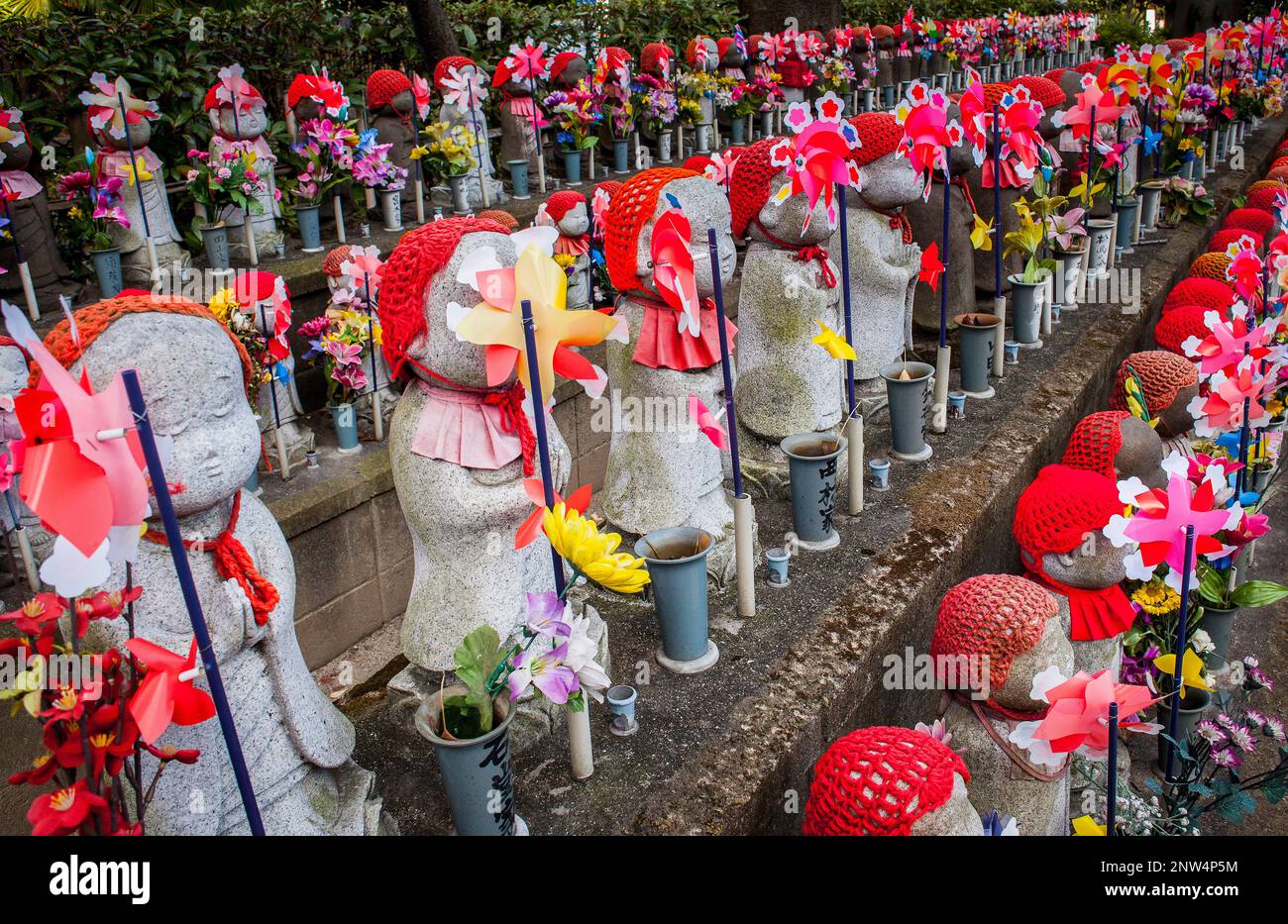 Statues of Jizo dedicated to dead unborn children, in Zojoji temple ...