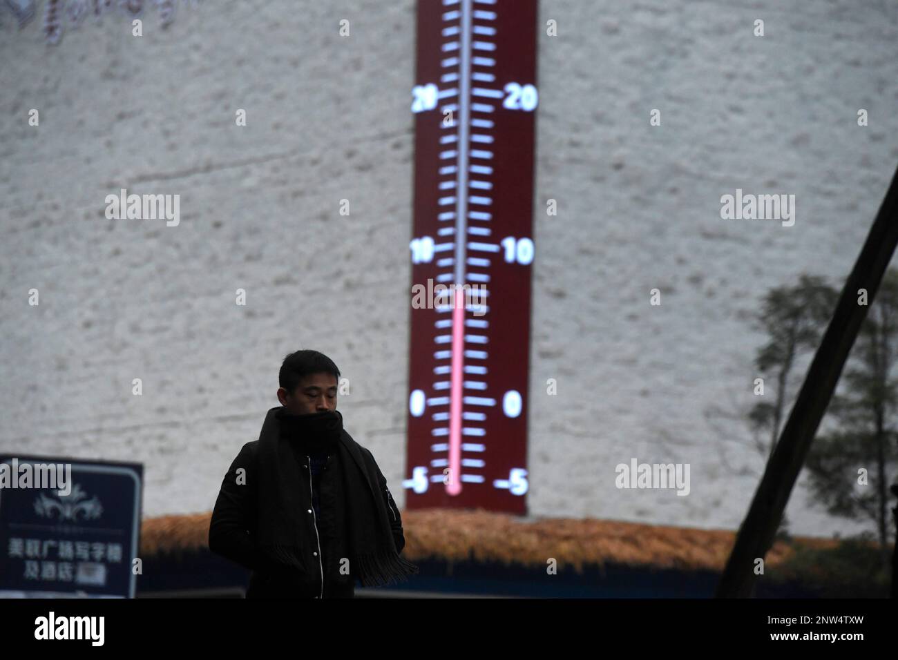 A 11 meters high thermometer was set up on the outer wall of a red wine ...