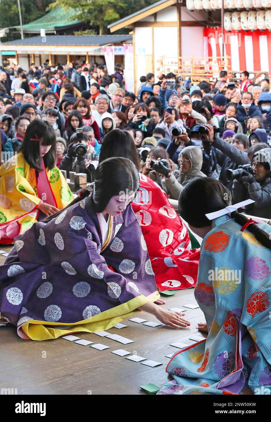 14 female and men wearing an ancient costume attend karuta hajime ...