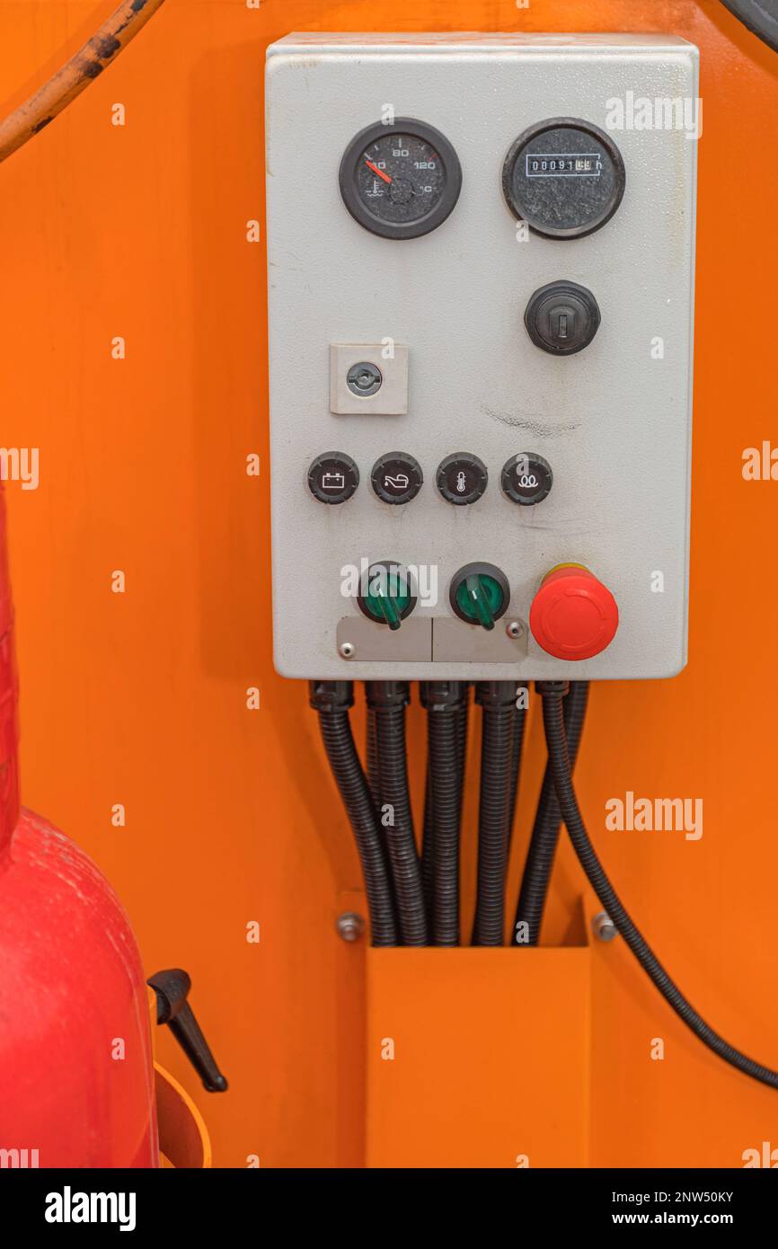 Control Panel Push Buttons and Gauges at Construction Machine Stock Photo - Alamy