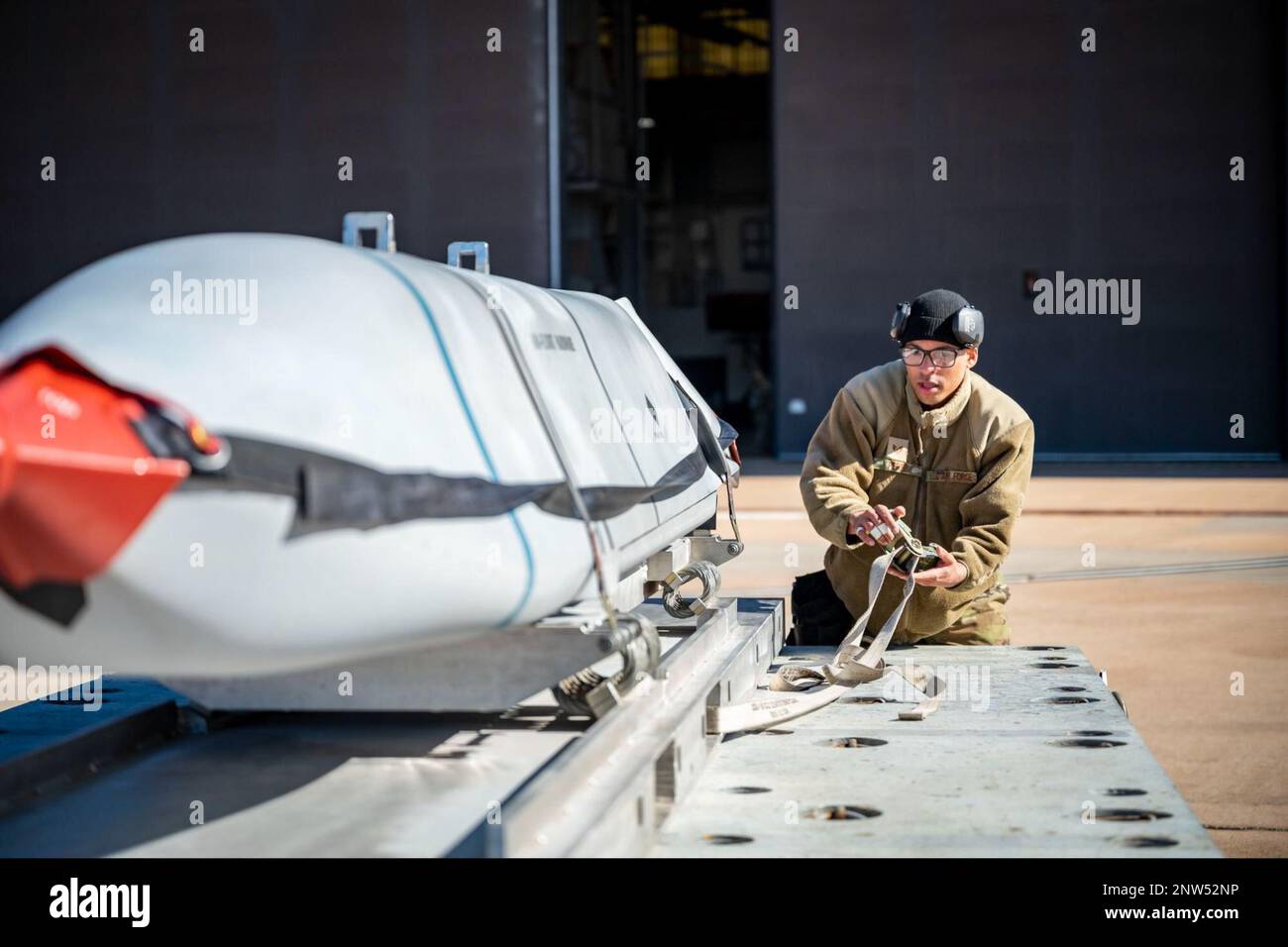 A load crew member assigned to the 28th Aircraft Maintenance Unit ...