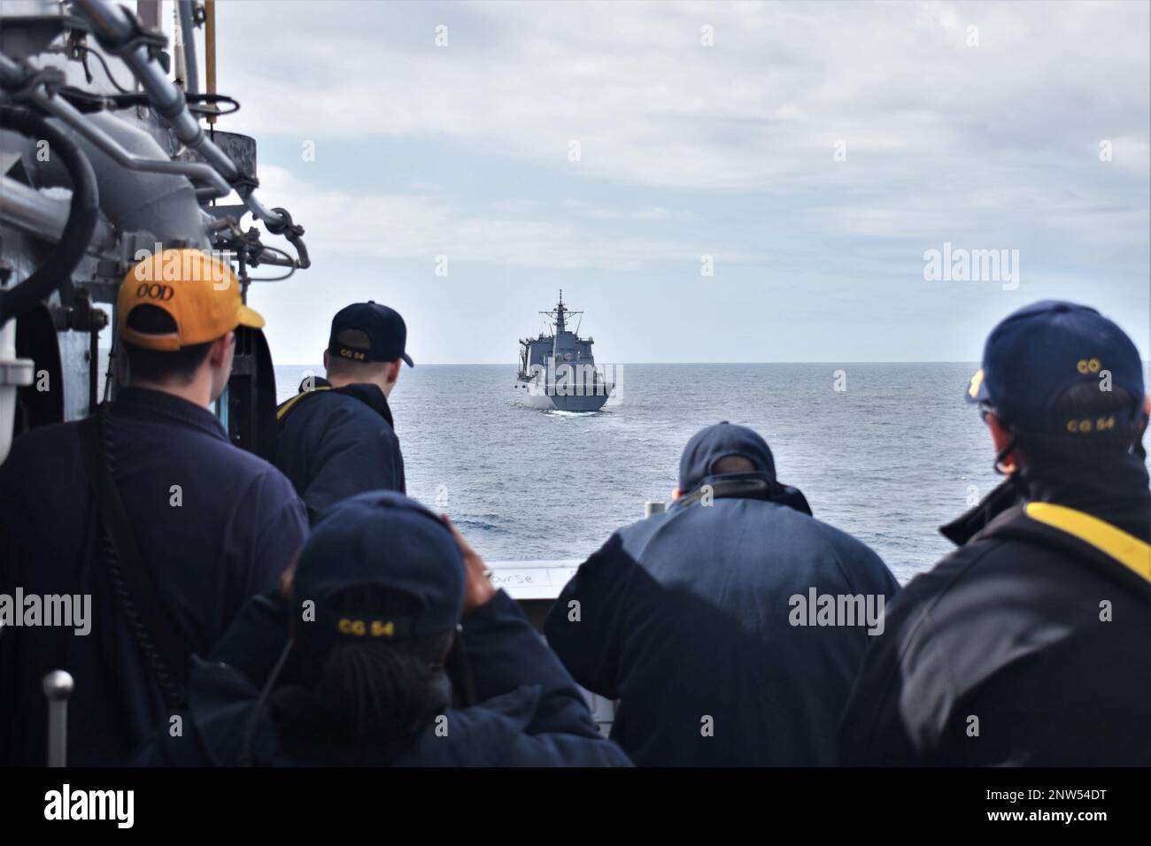 230126-N-TV933-1923 PHILIPPINE SEA (January 26, 2023) The bridge team ...