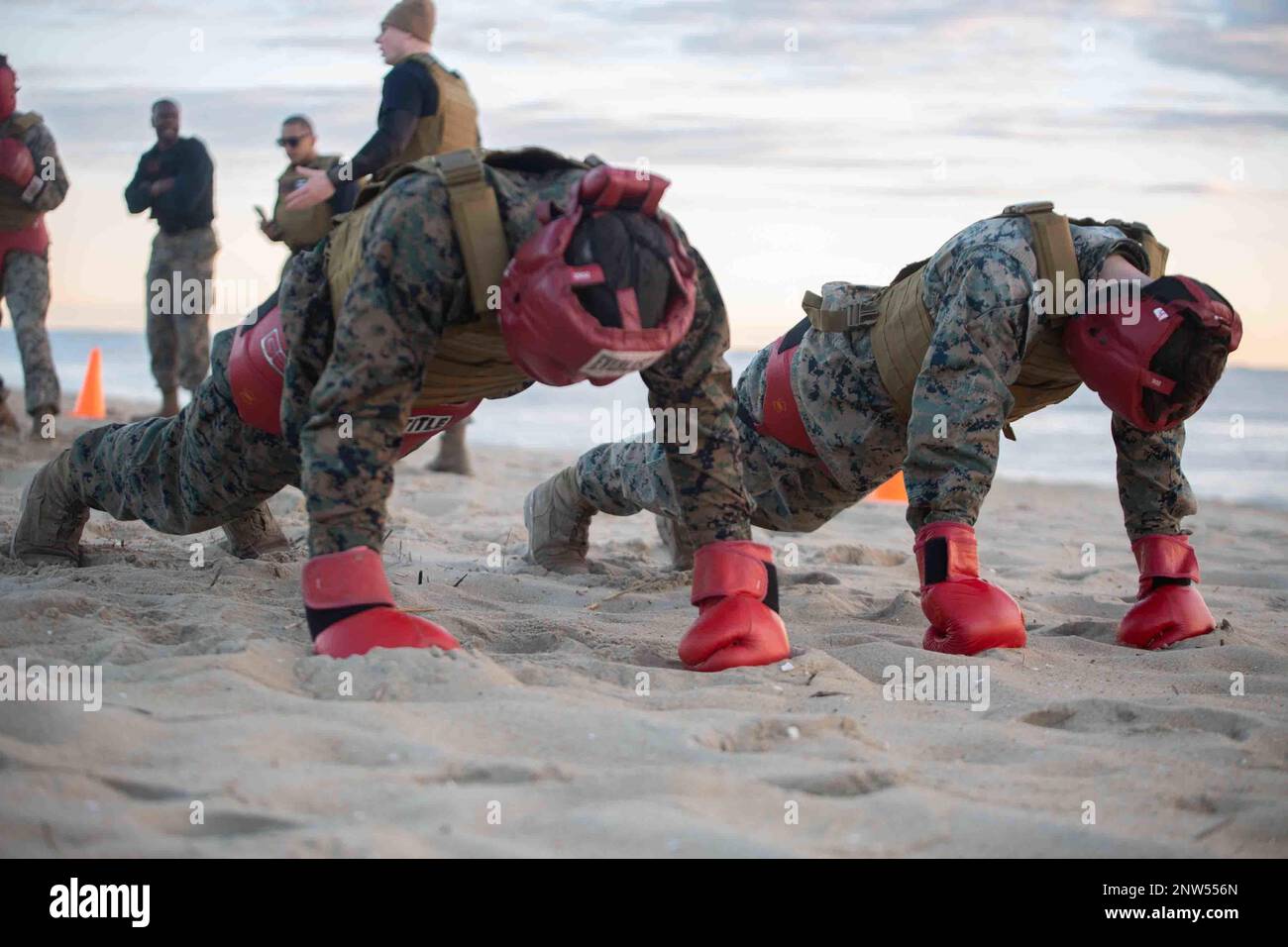 U.S. Marine Corps 1st Lt. Thomas R. Grover, left, a deputy staff judge ...