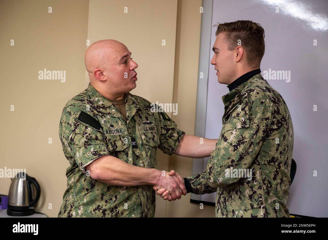 Hospitalman Joseph Detamore is recognized by Captain Steve Aboona ...