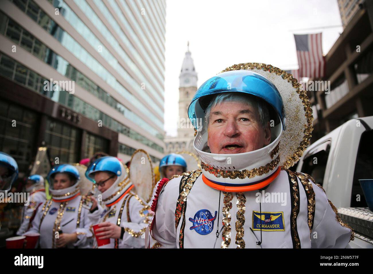 Harry Dougherty, of the Golden Sunrise Fancy Brigade, waits on the 1500 ...