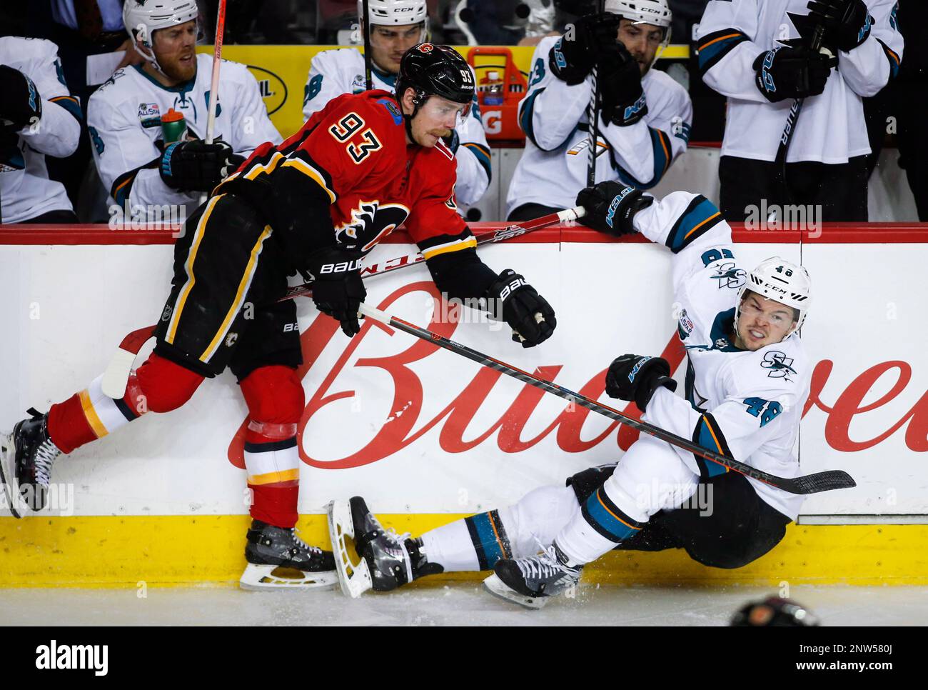 San Jose Sharks' Tomas Hertl, right, of the Czech Republic, is checked ...