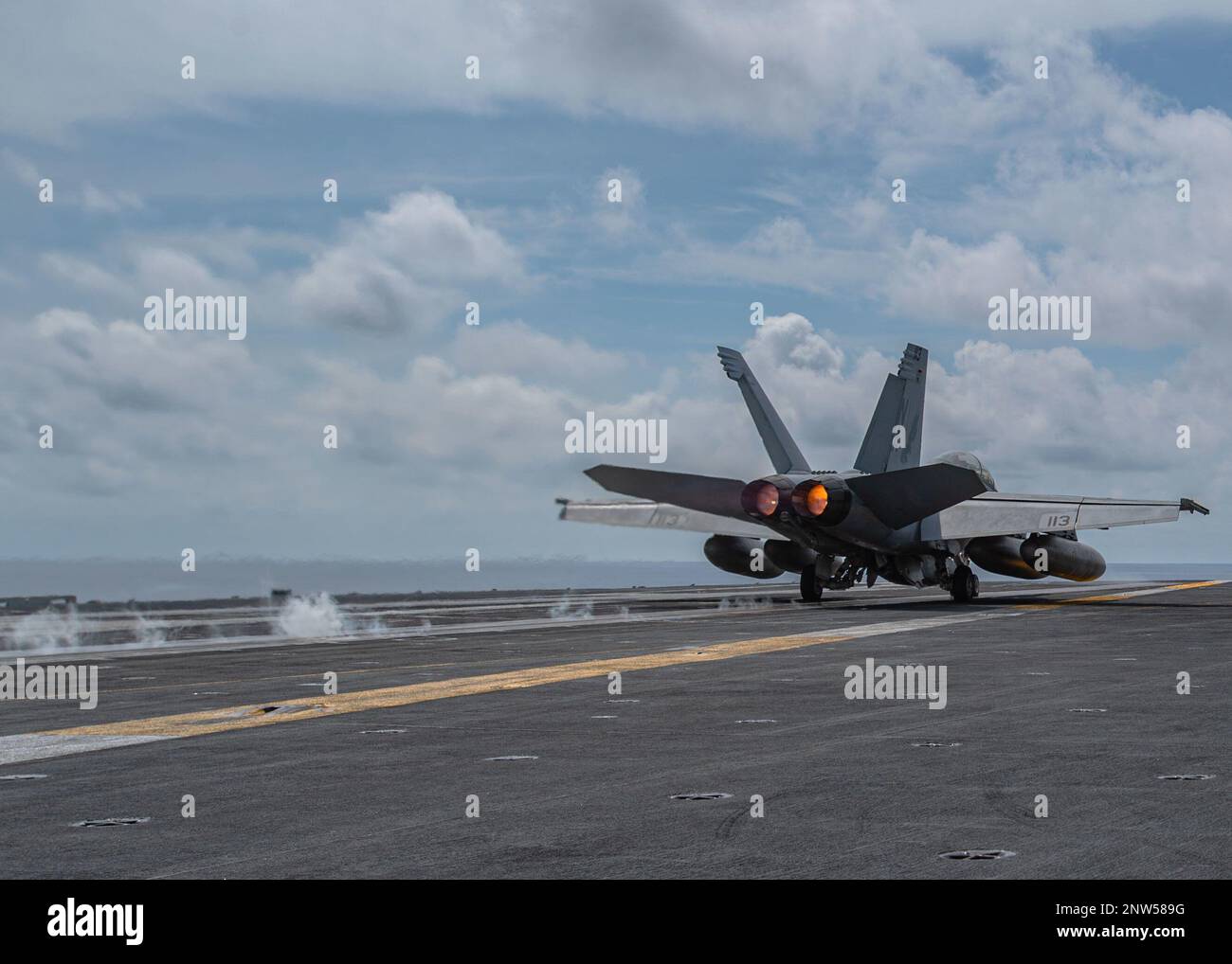 230114-N-MH015-1028 SOUTH CHINA SEA (Jan. 14, 2023) An F/A-18F Super Hornet from the “Fighting ...