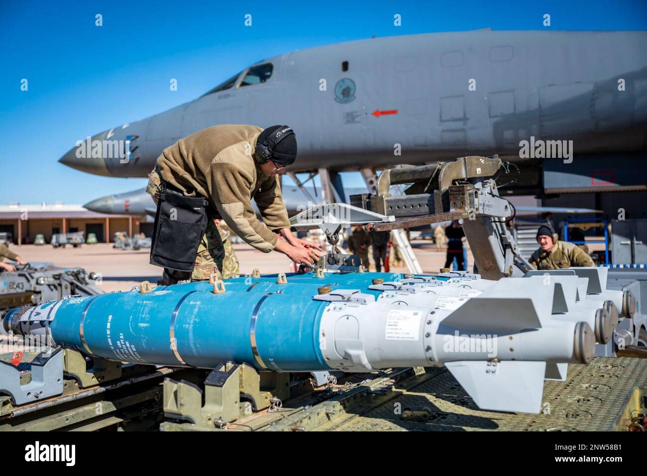 Weapons load crew members assigned to the 28th Aircraft Maintenance ...