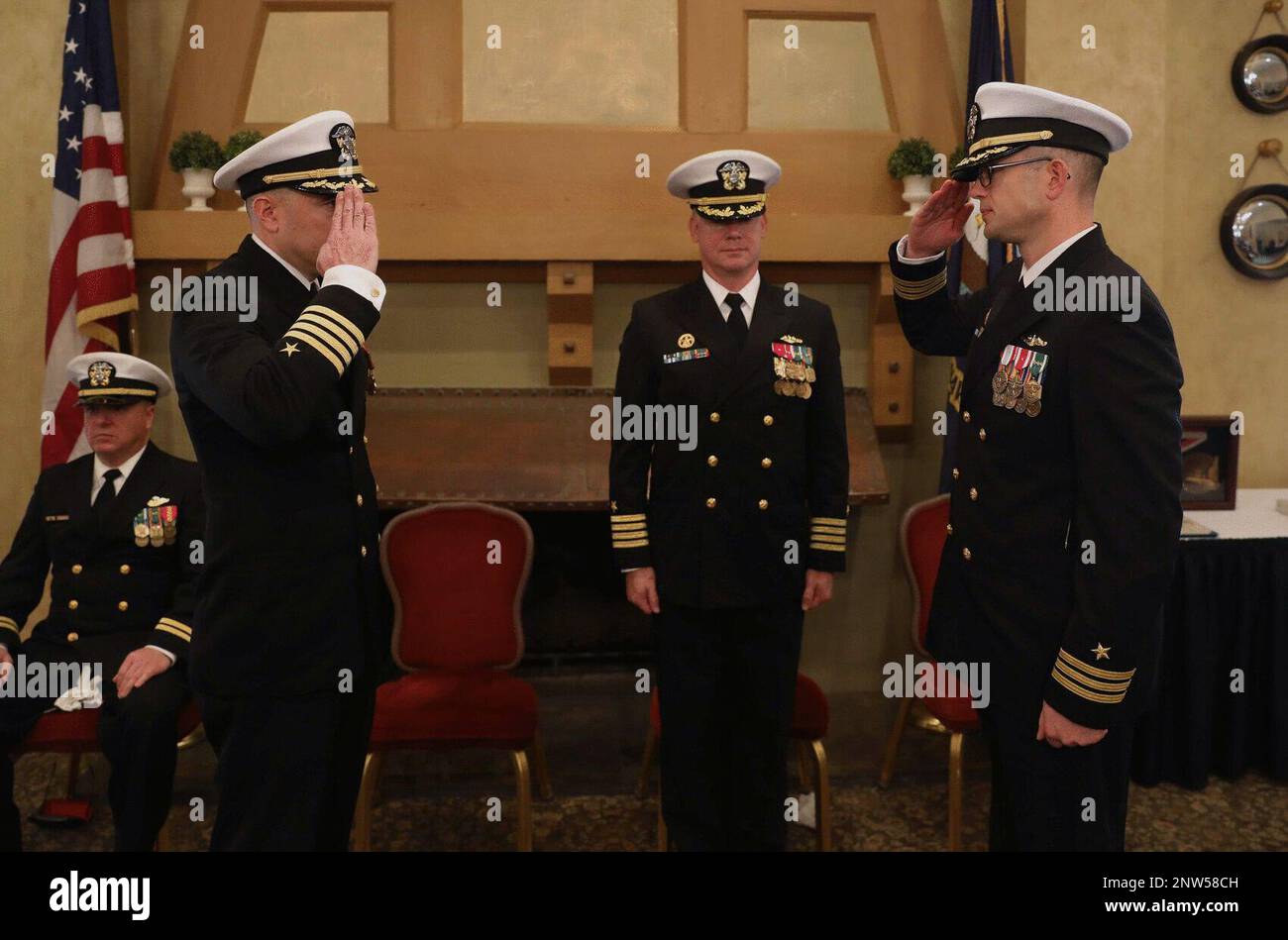 Capt. Bennett Christman, left, is relieved by Cmdr. Carl Jappert, right ...