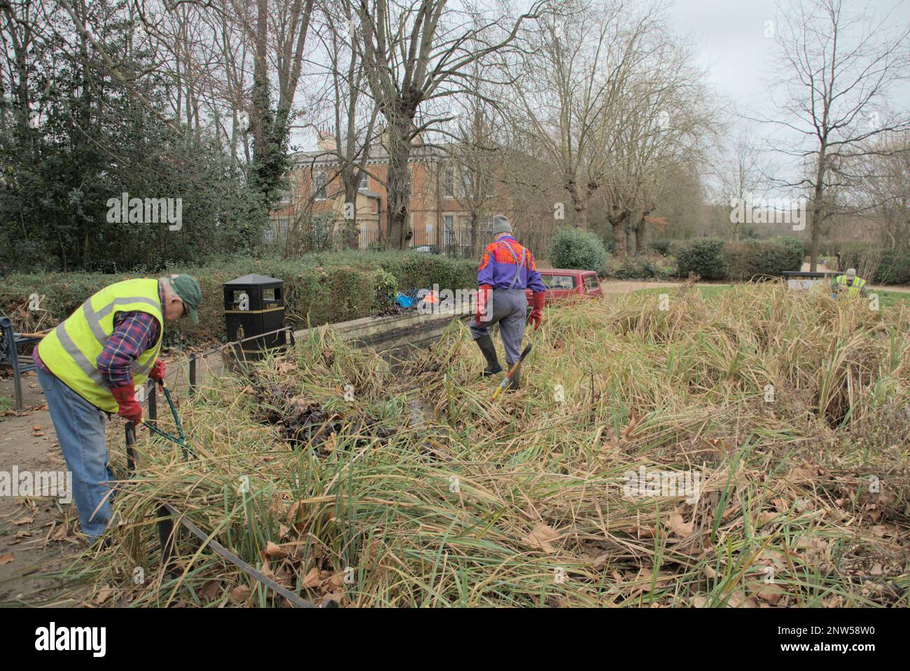 London, United Kingdom, 12 February 2023: Group of men volunteers in ...