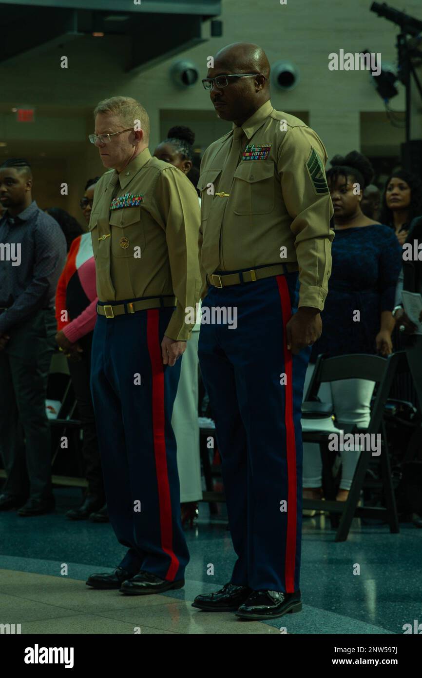 Col. Rory Kent, Left, and MSgt. Ralph Wright stand at attention during ...