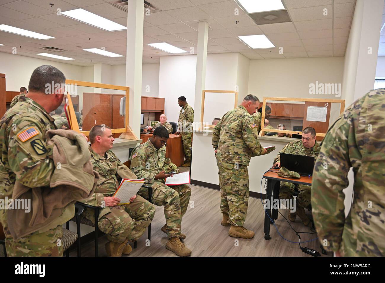 Soldiers are shown processing through the Fort Dix JRC. (Images ...