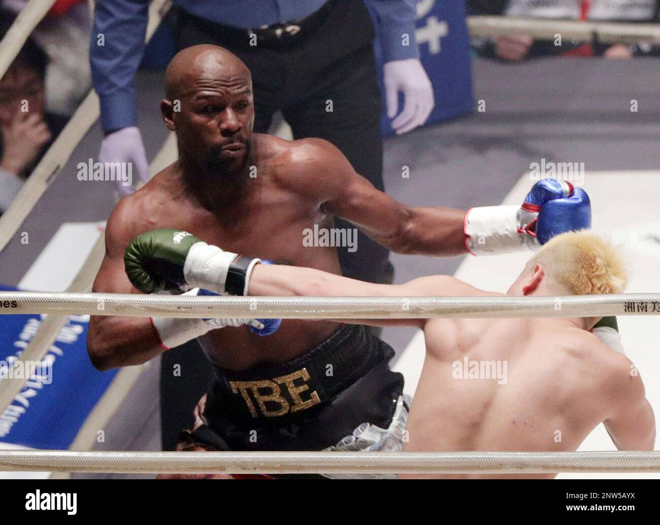 Former boxing champion Floyd Mayweather Jr. lands a punch to Japanese ...